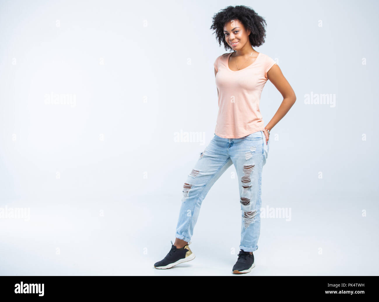 Happy african american woman isolated on white background Stock Photo ...