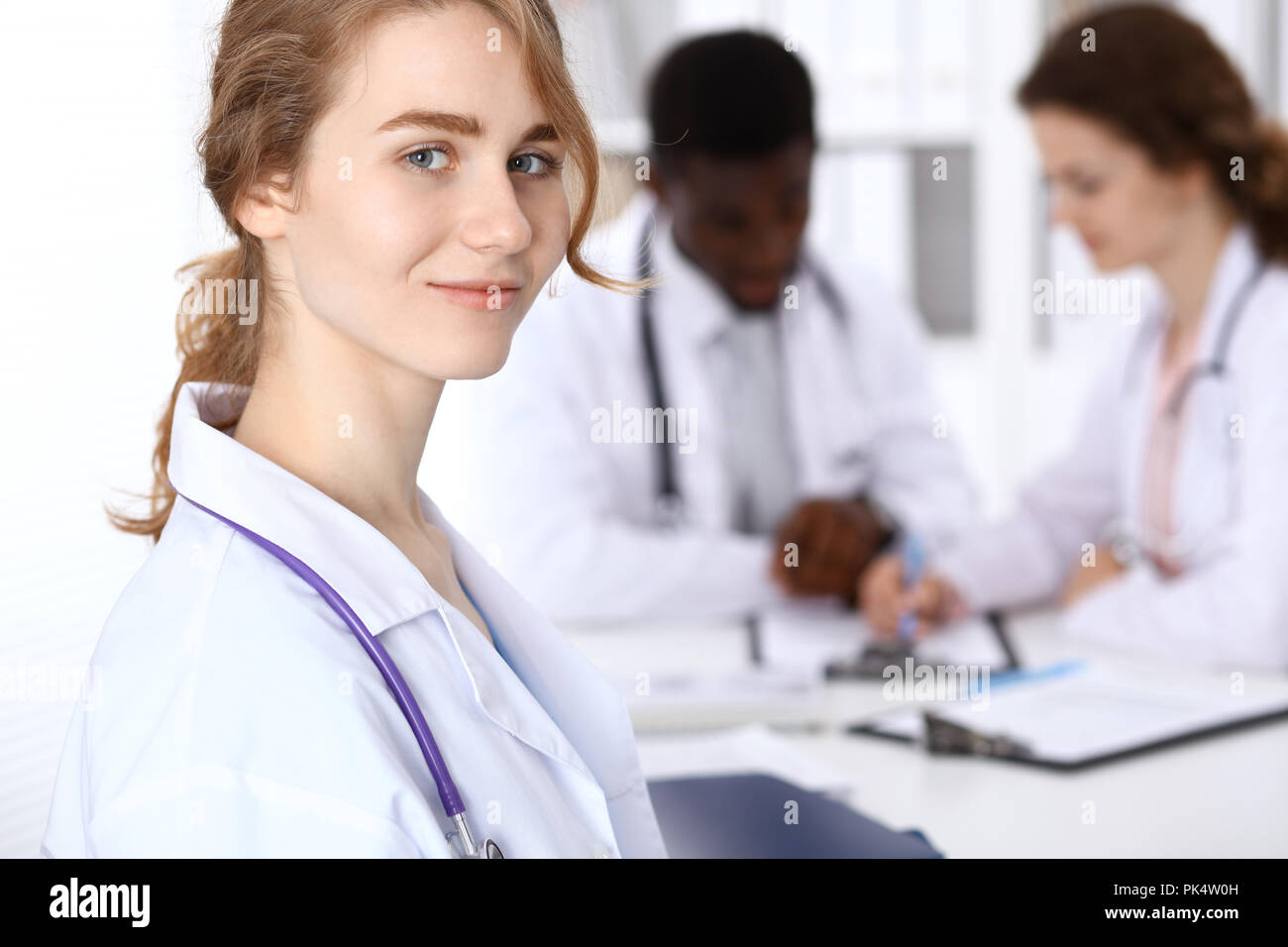 Happy doctor woman with medical staff at the hospital Stock Photo - Alamy Happy doctor woman with medical staff at the hospital Stock Photo - Alamy