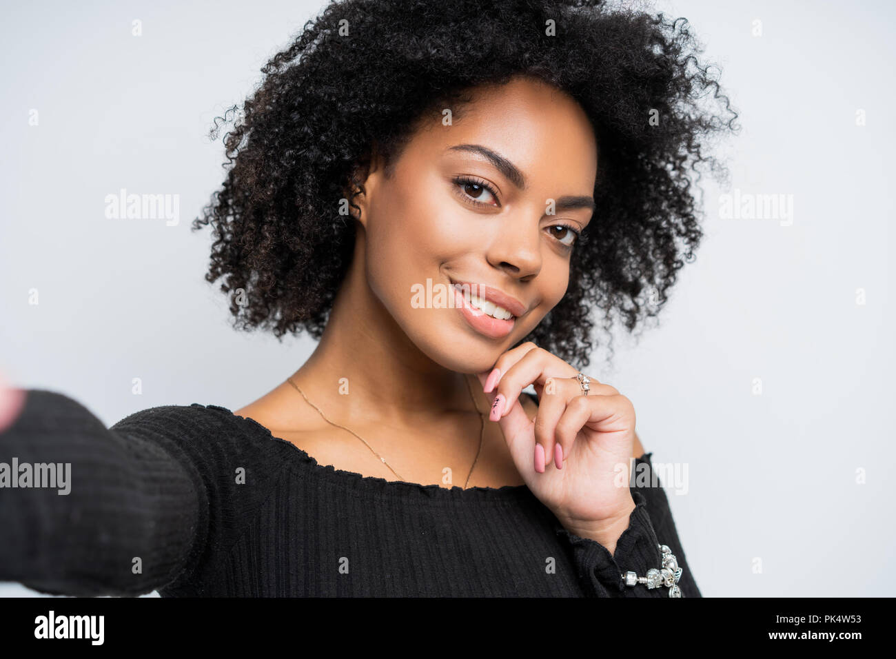 Close up self portrait of a beautiful african american woman taking a ...