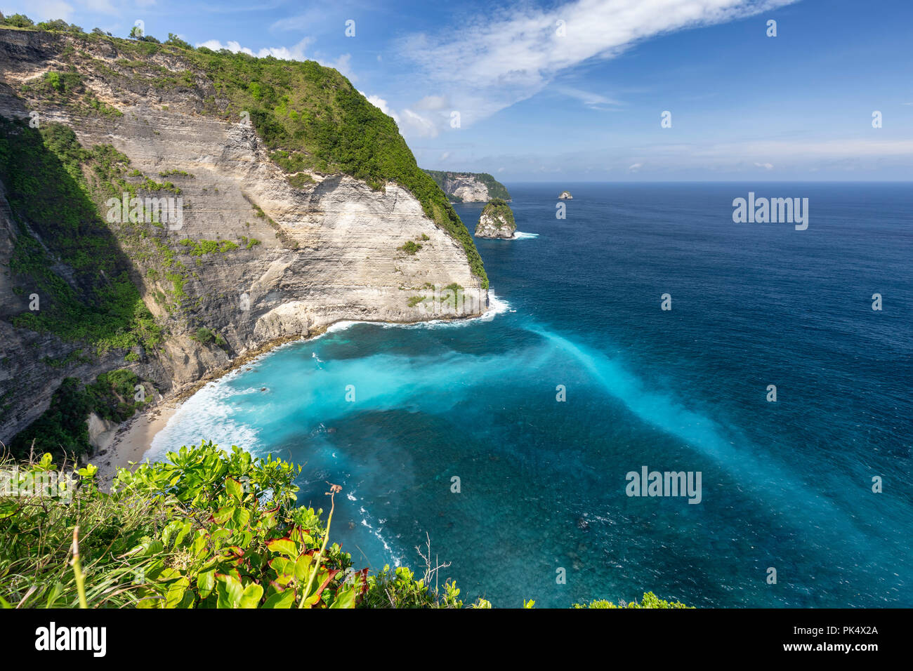 Interesting beach sediment interacting with the ocean at Puluang Cliff ...