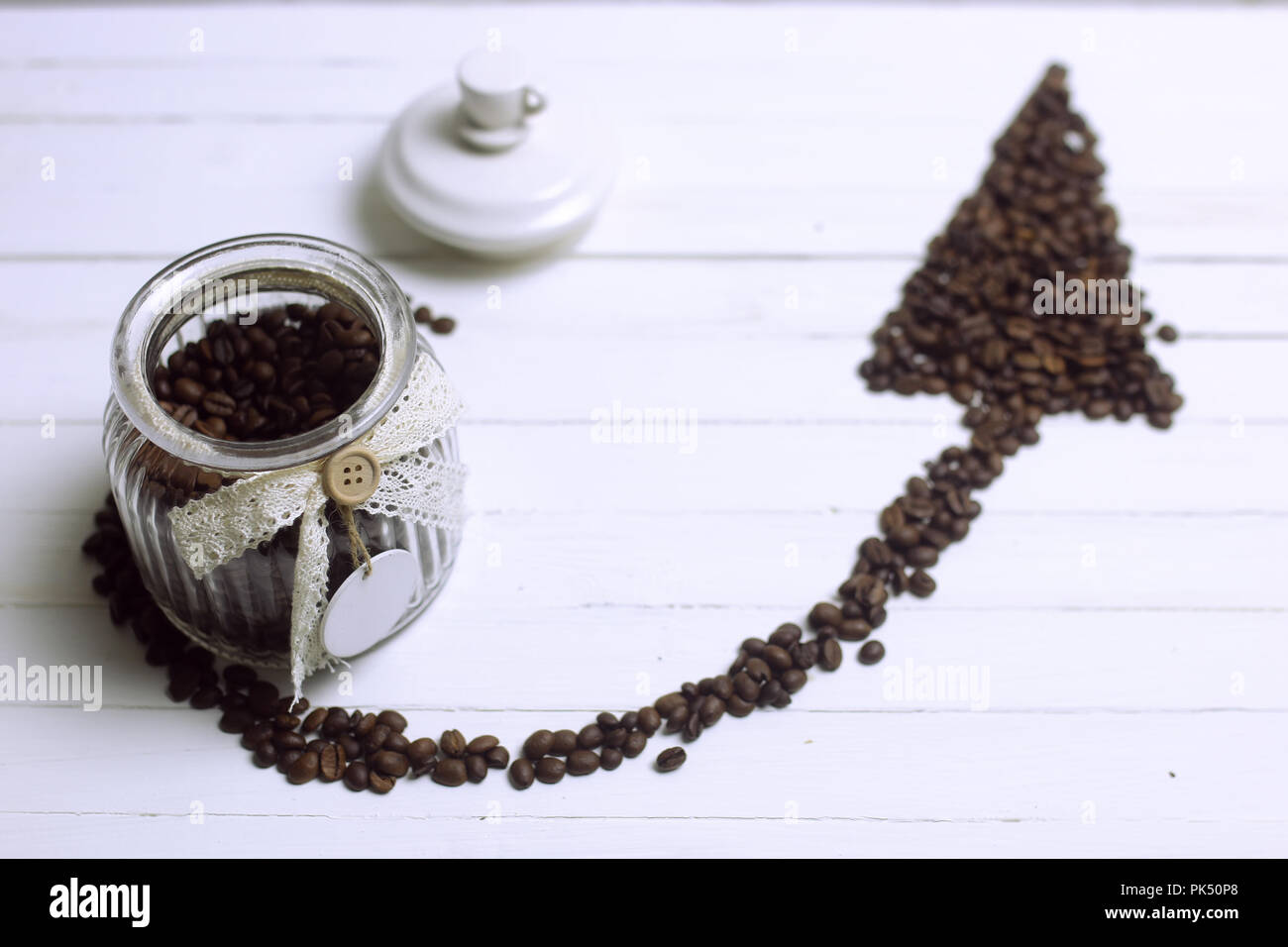 coffee bean arrow Stock Photo - Alamy
