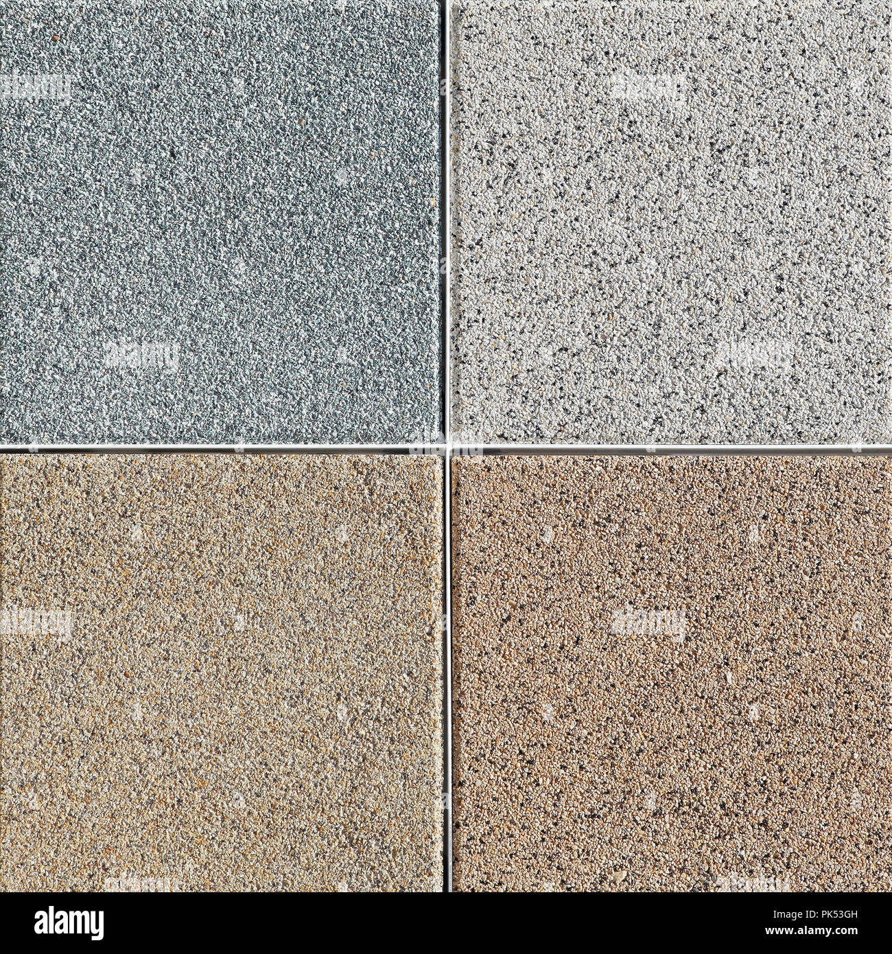Pavement tiles made from natural stone material Stock Photo - Alamy