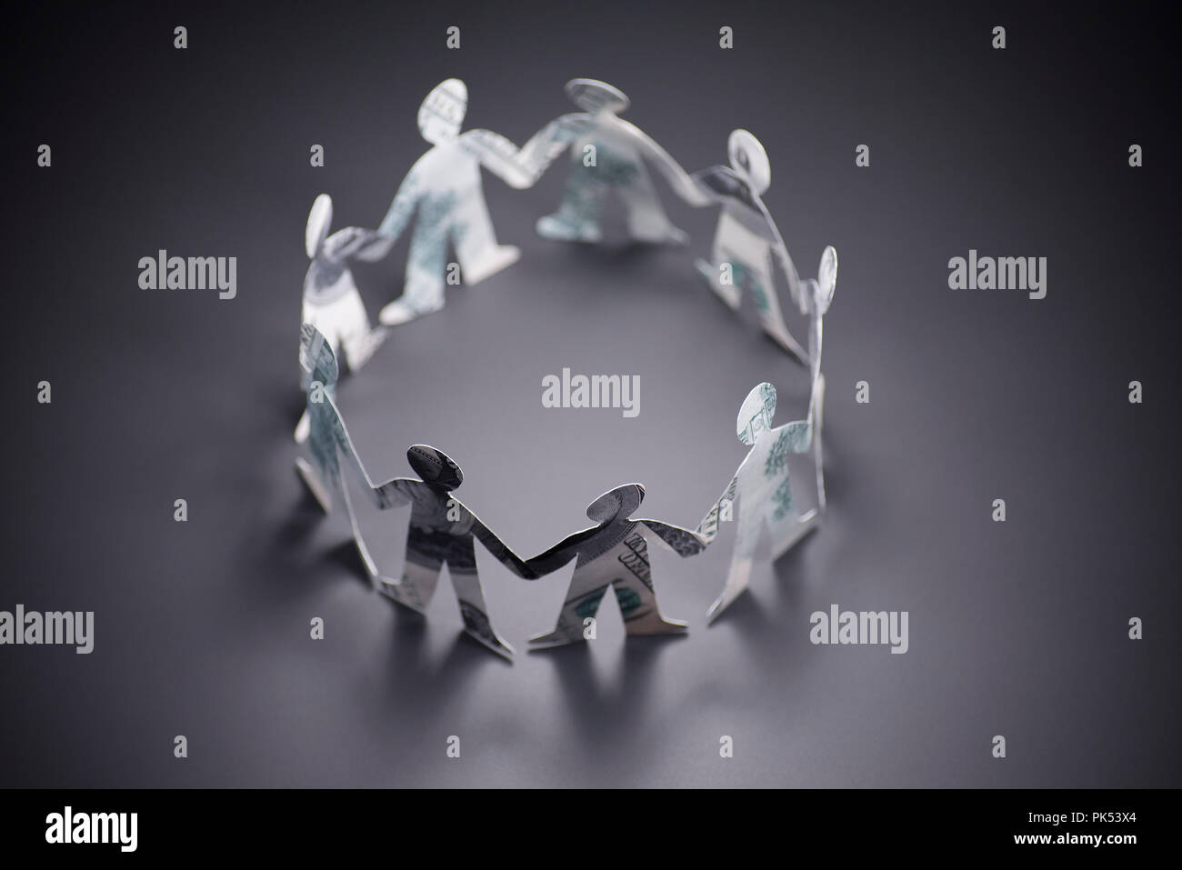 Circle of paper chain people hi-res stock photography and images - Alamy