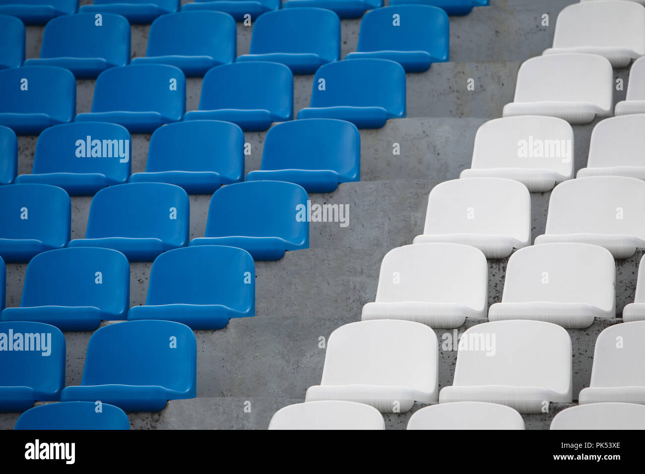 Close up empty blue seats hi-res stock photography and images - Alamy