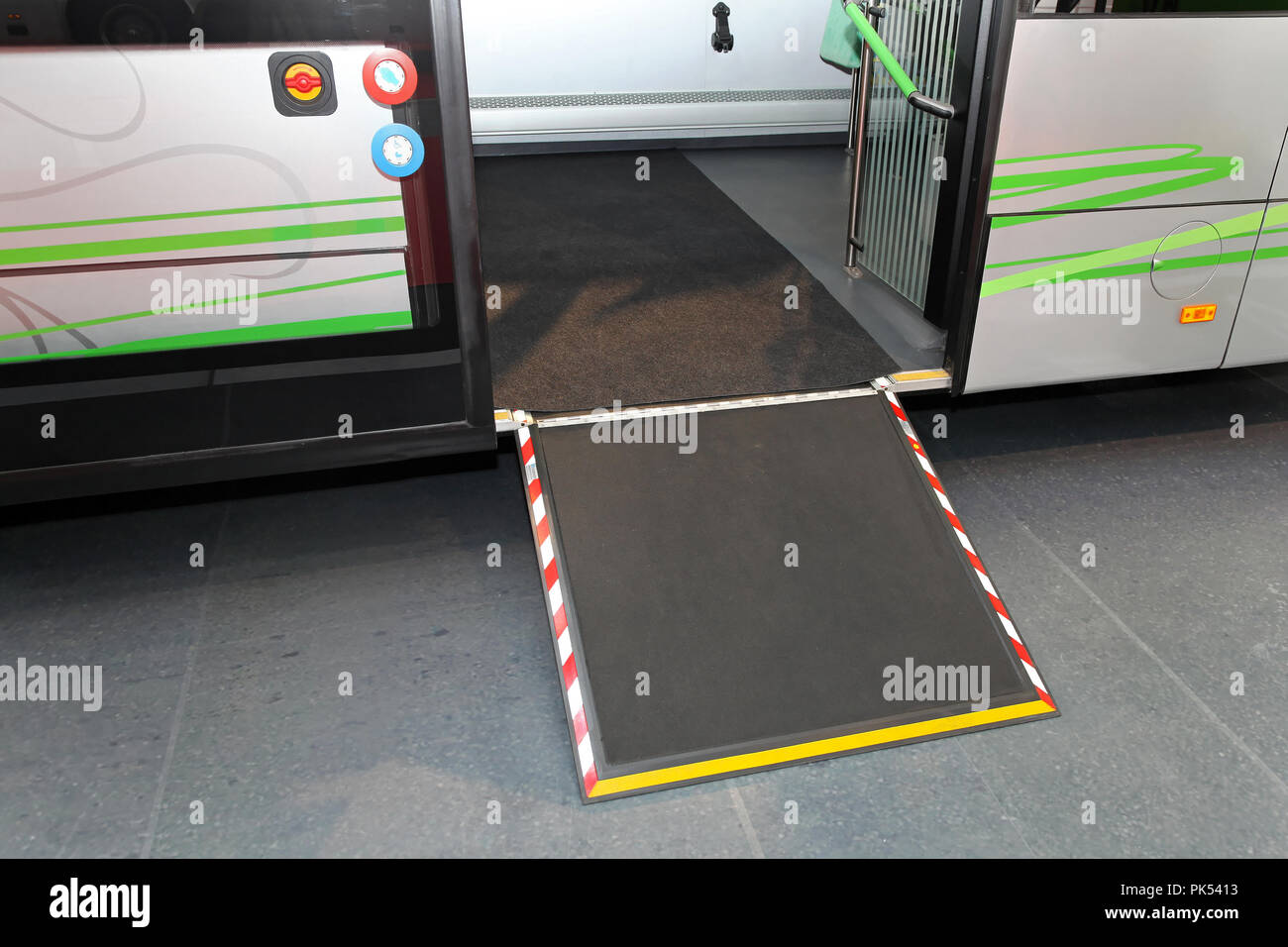 Door and ramp for wheelchair at city bus Stock Photo - Alamy
