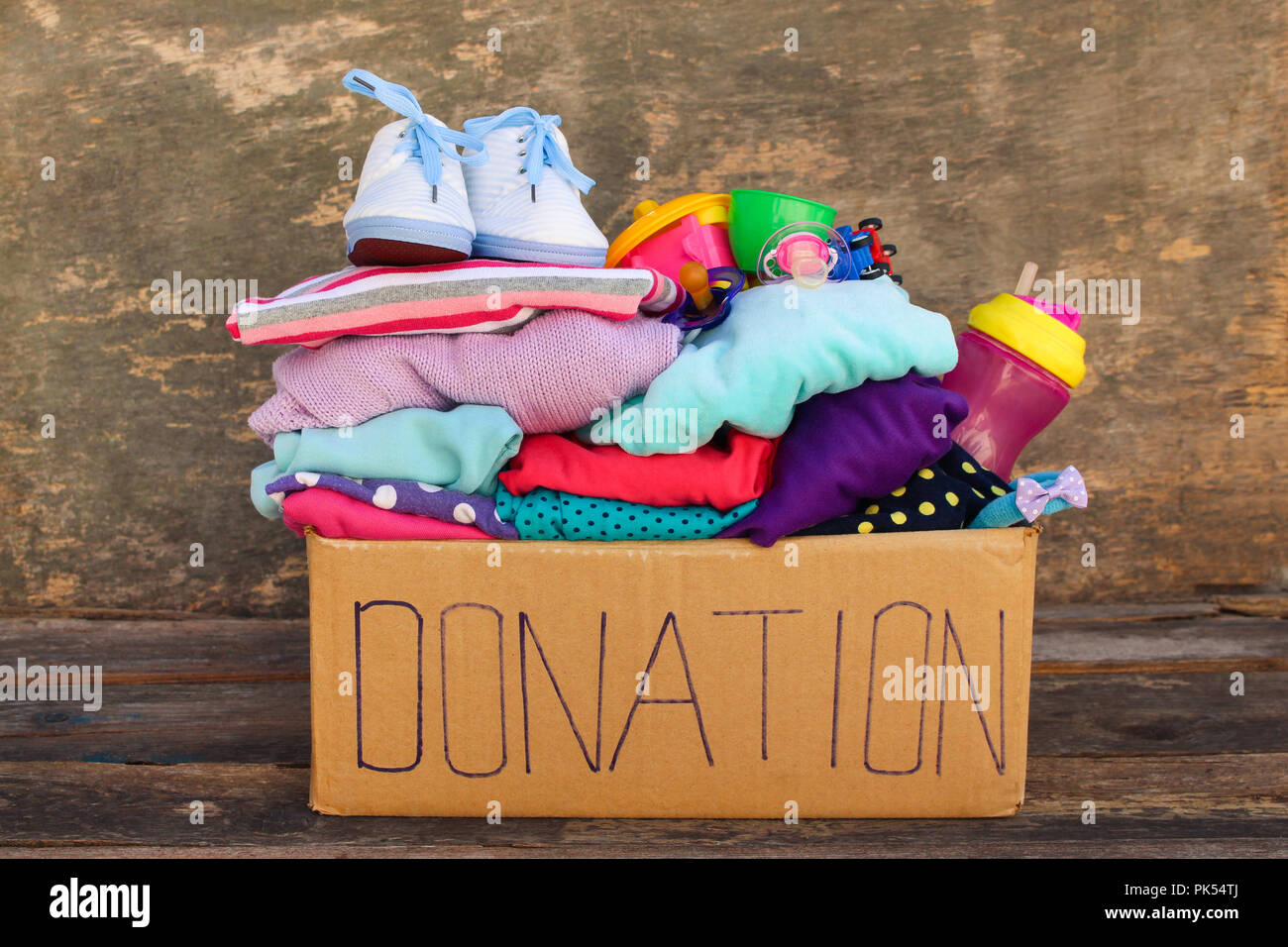 Clothing donation box hi-res stock photography and images - Alamy