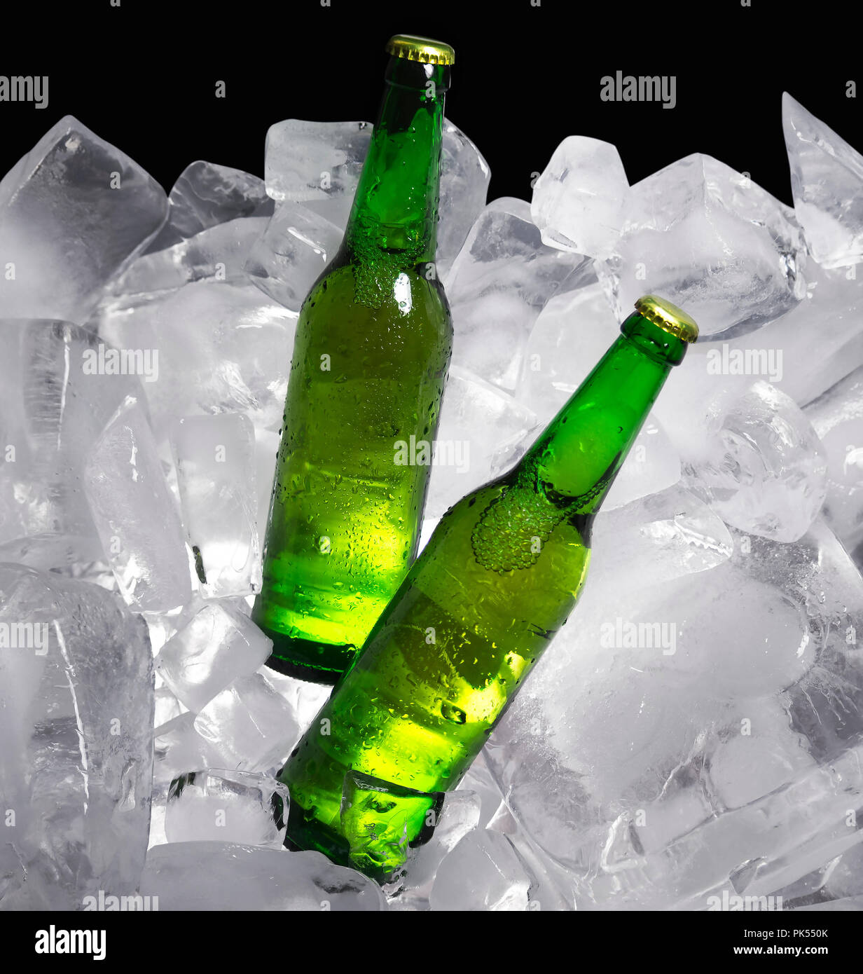 Bottles of beer on ice Stock Photo - Alamy
