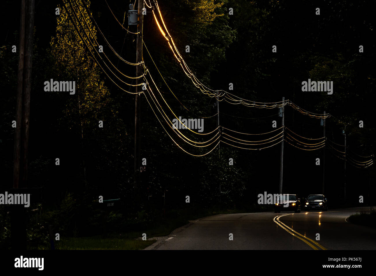 Electric lines rural road hi-res stock photography and images - Alamy