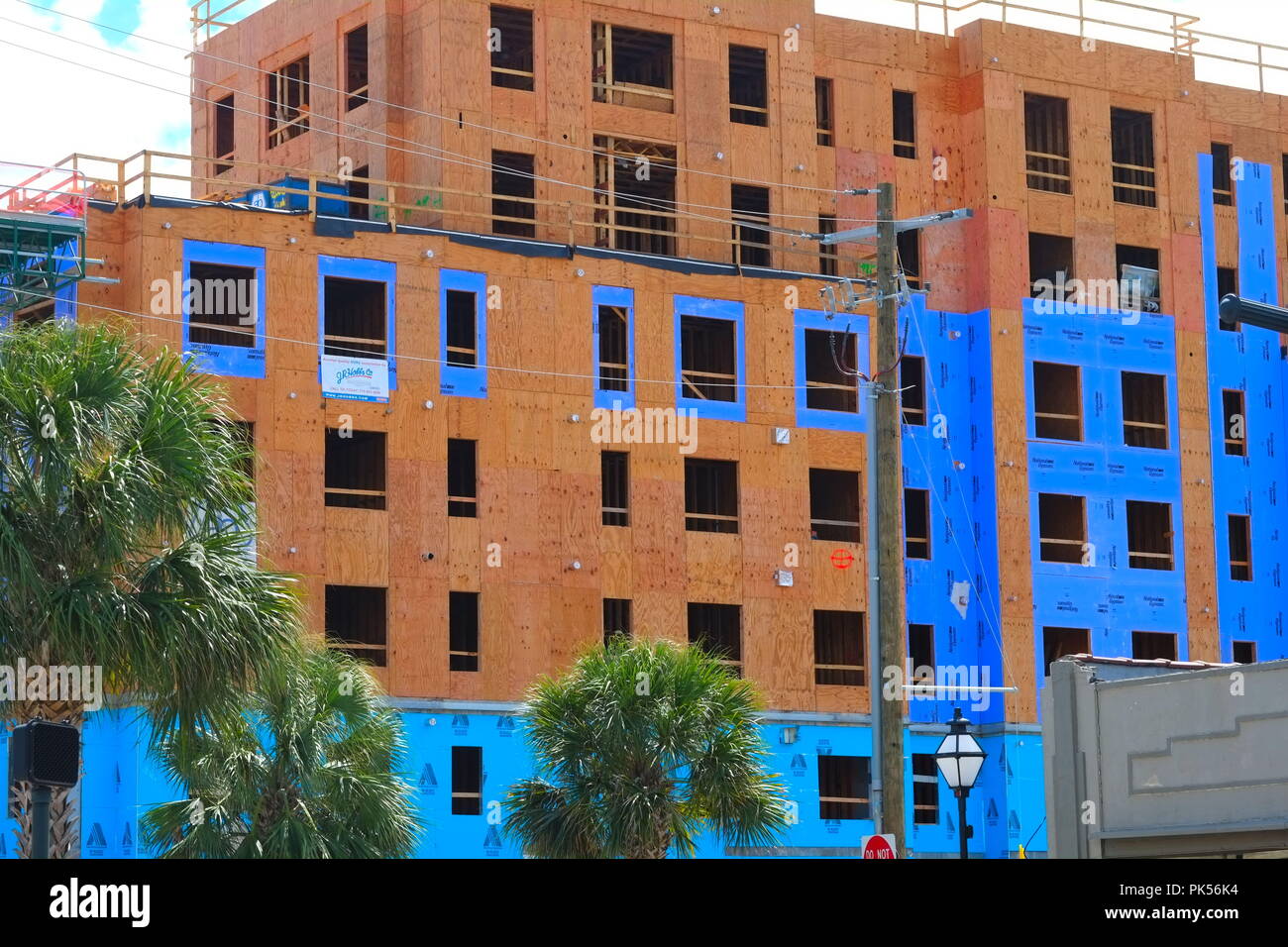 Colors of Construction of New Building Sheathed in Plywood Stock Photo ...