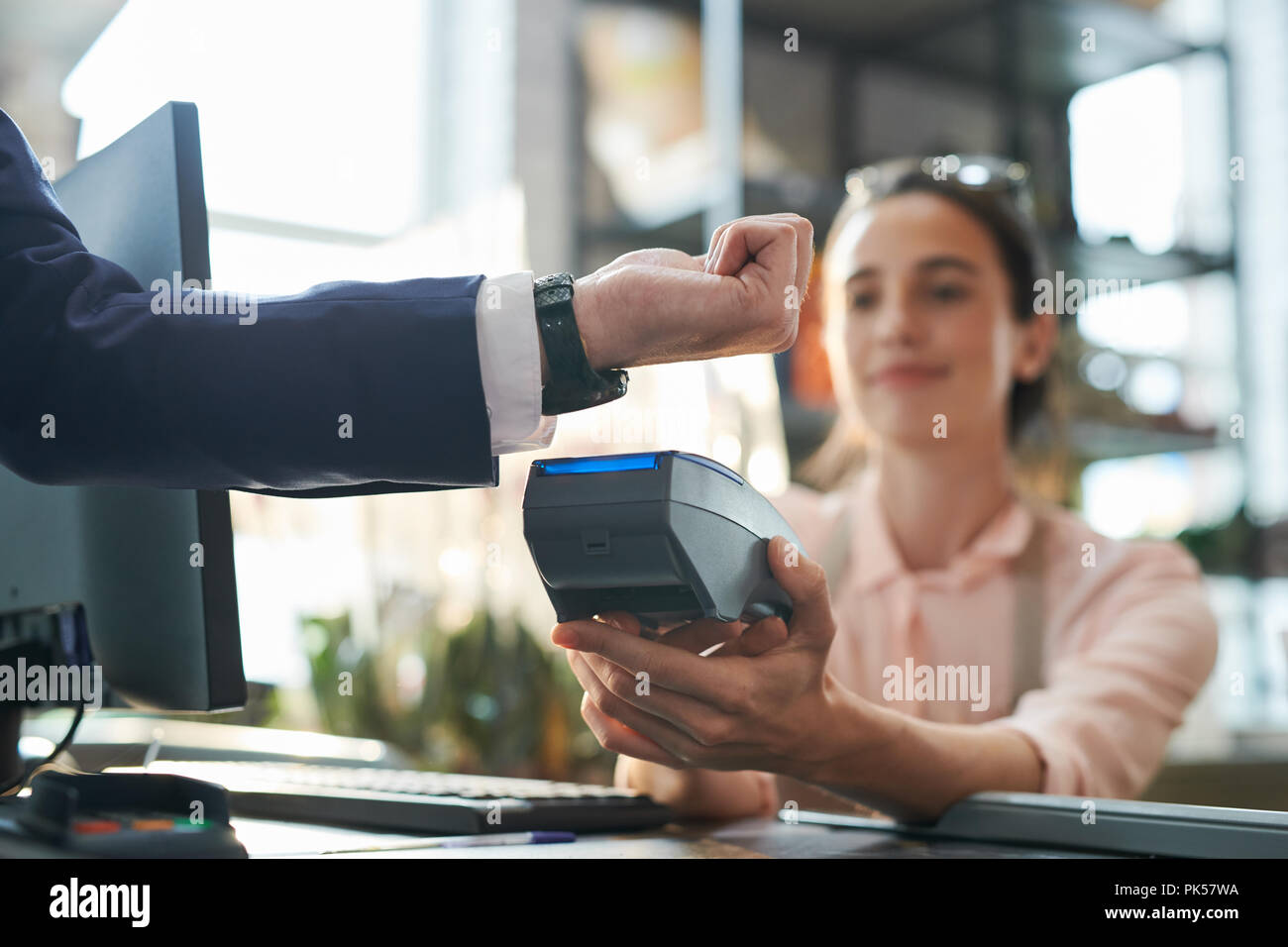 Contactless payment using smartwatch hi-res stock photography and ...