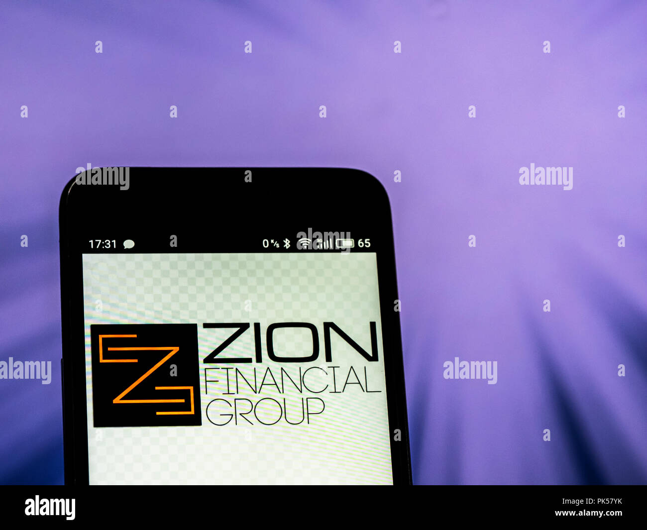 Zion Financial Group logo seen displayed on a smart phone Stock Photo ...