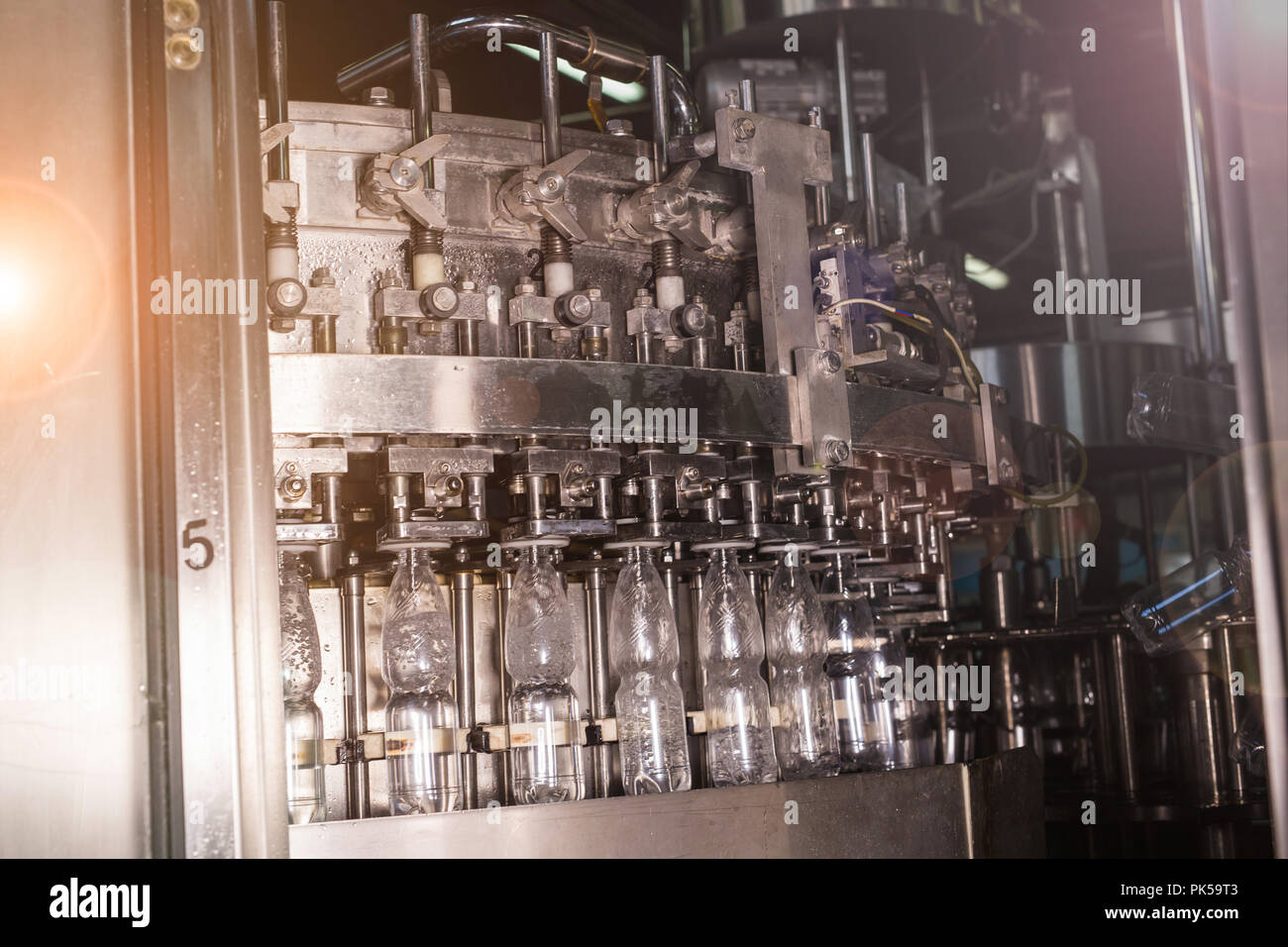 Production line in a factory for mineral water Stock Photo - Alamy