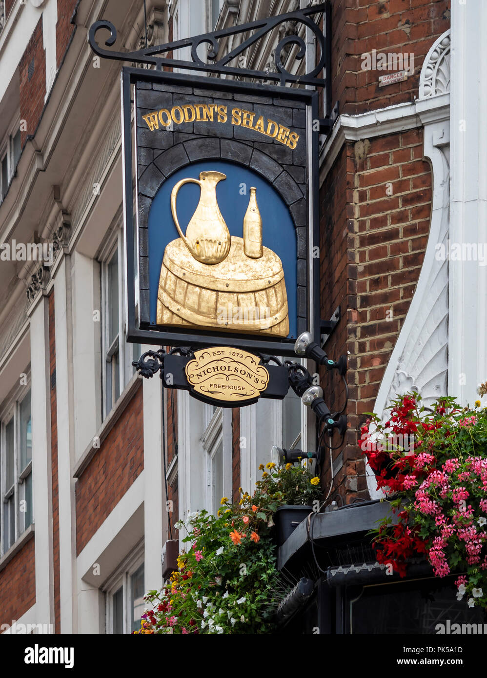 LONDON, UK - SEPTEMBER 09, 2018: Unusual sign outside Woodin's Shades ...