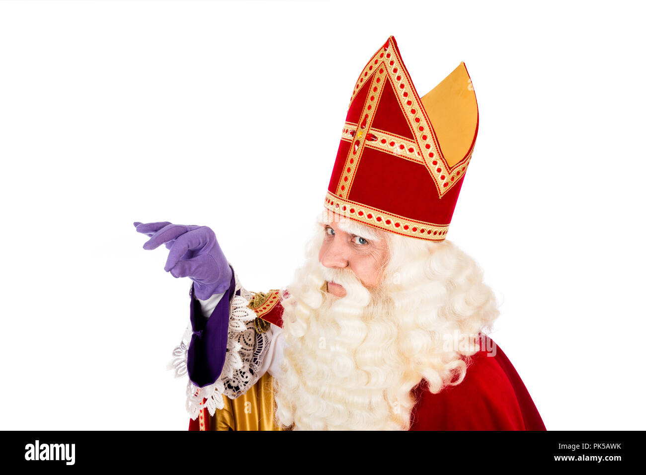 Saint Nicholas holding something in his hand with space for attribute ...