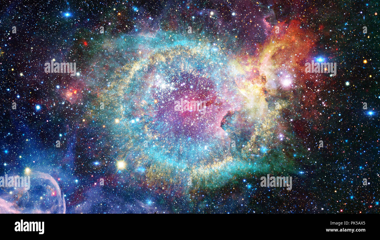 The Helix Nebula in deep space. Elements of this image furnished by ...