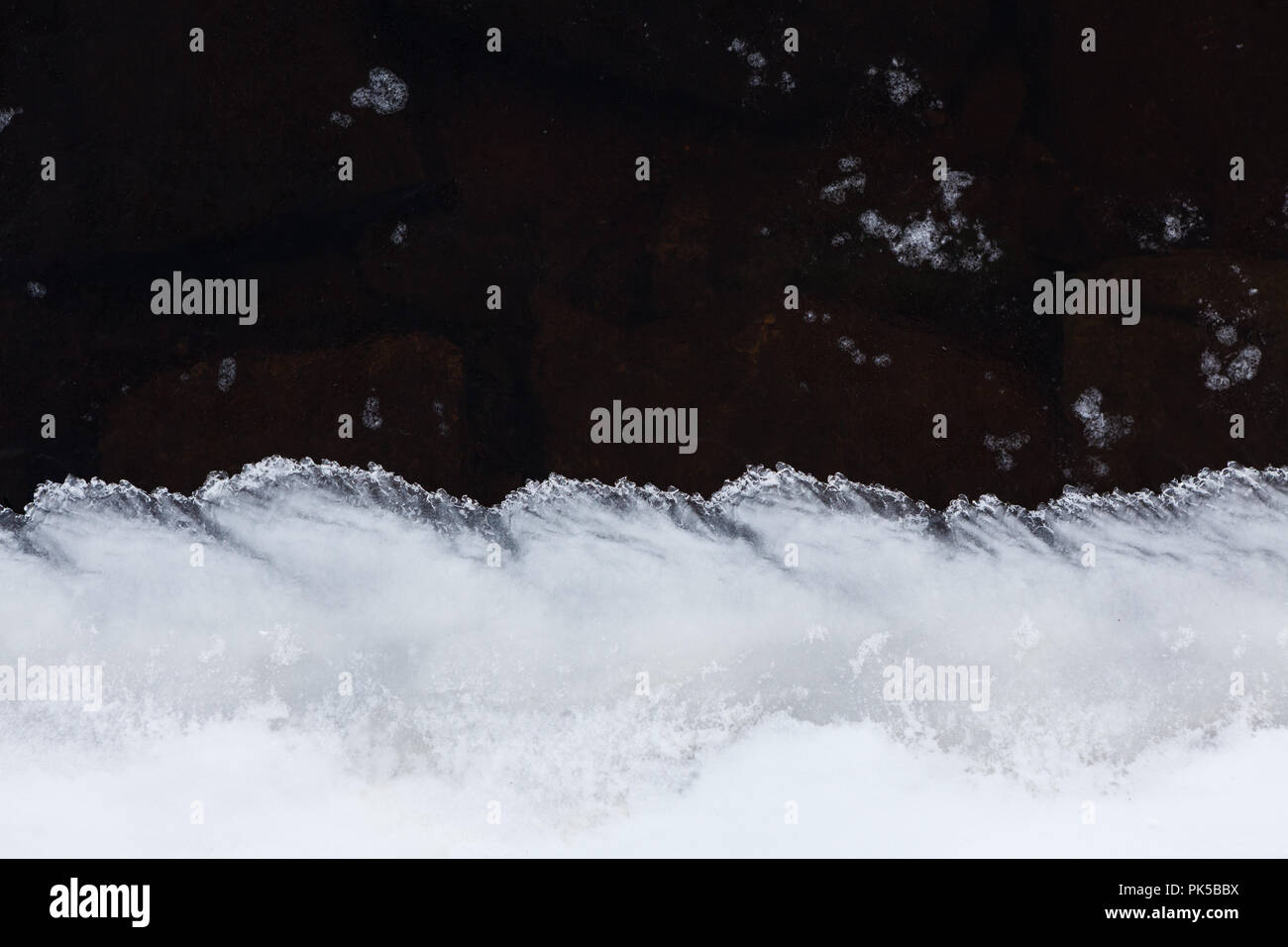 Ice edge on water Stock Photo - Alamy