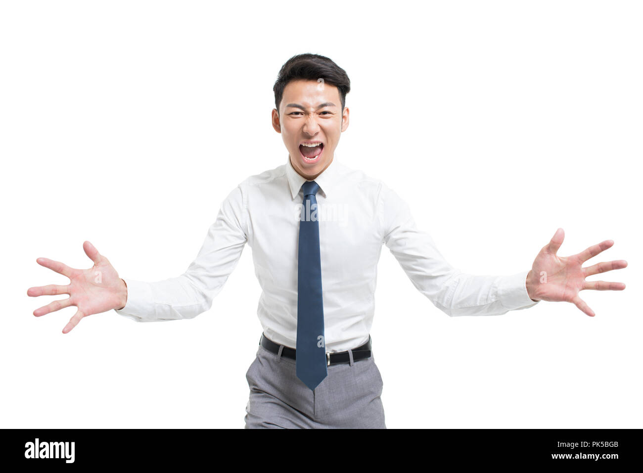 Excited young businessman Stock Photo - Alamy
