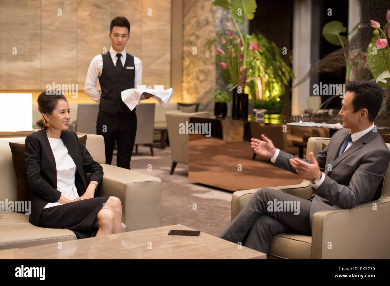 Successful business people talking Stock Photo - Alamy