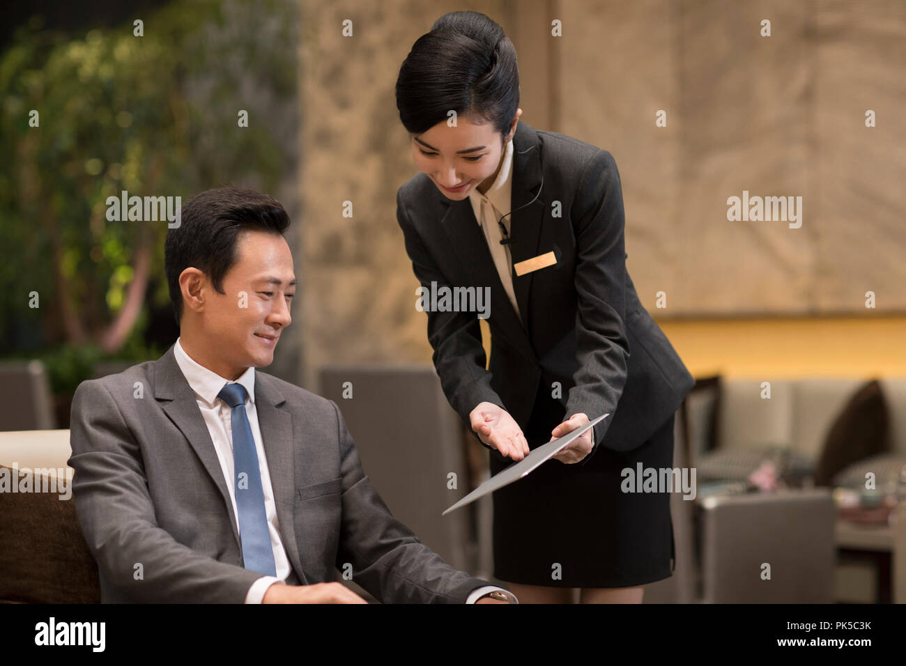 Professional service in luxury hotel Stock Photo - Alamy