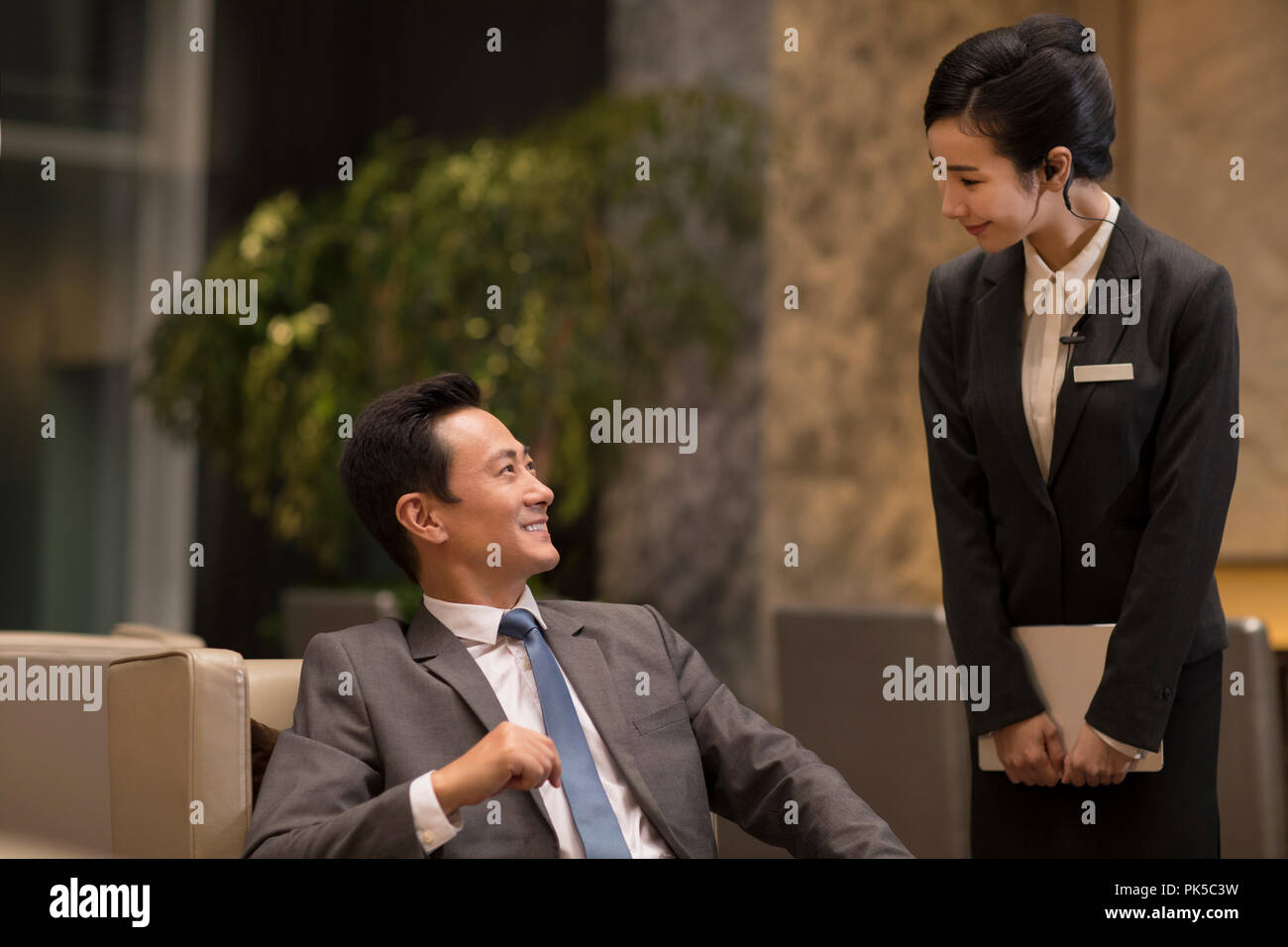 Professional service in luxury hotel Stock Photo - Alamy