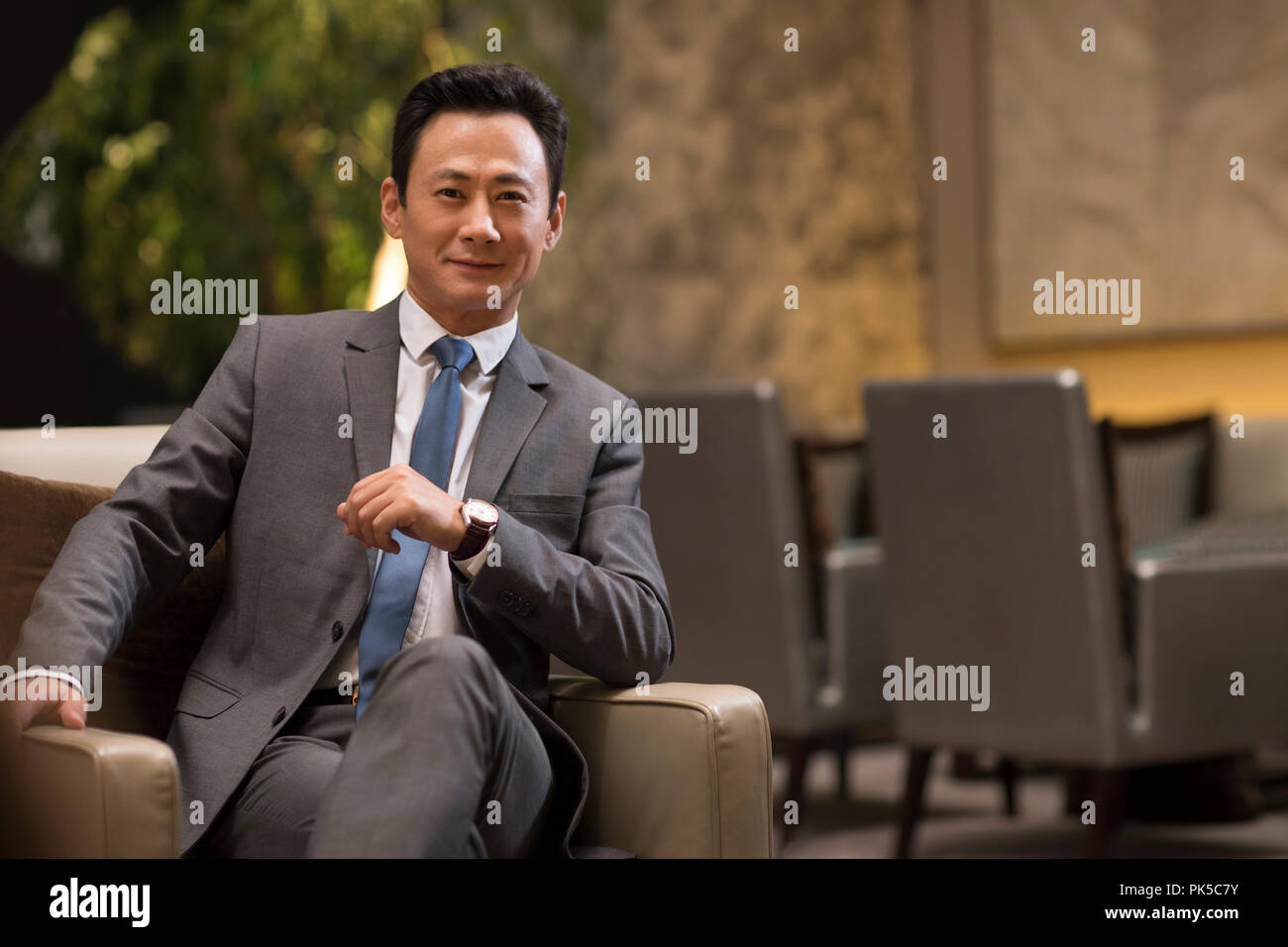 Portrait of successful businessman Stock Photo - Alamy