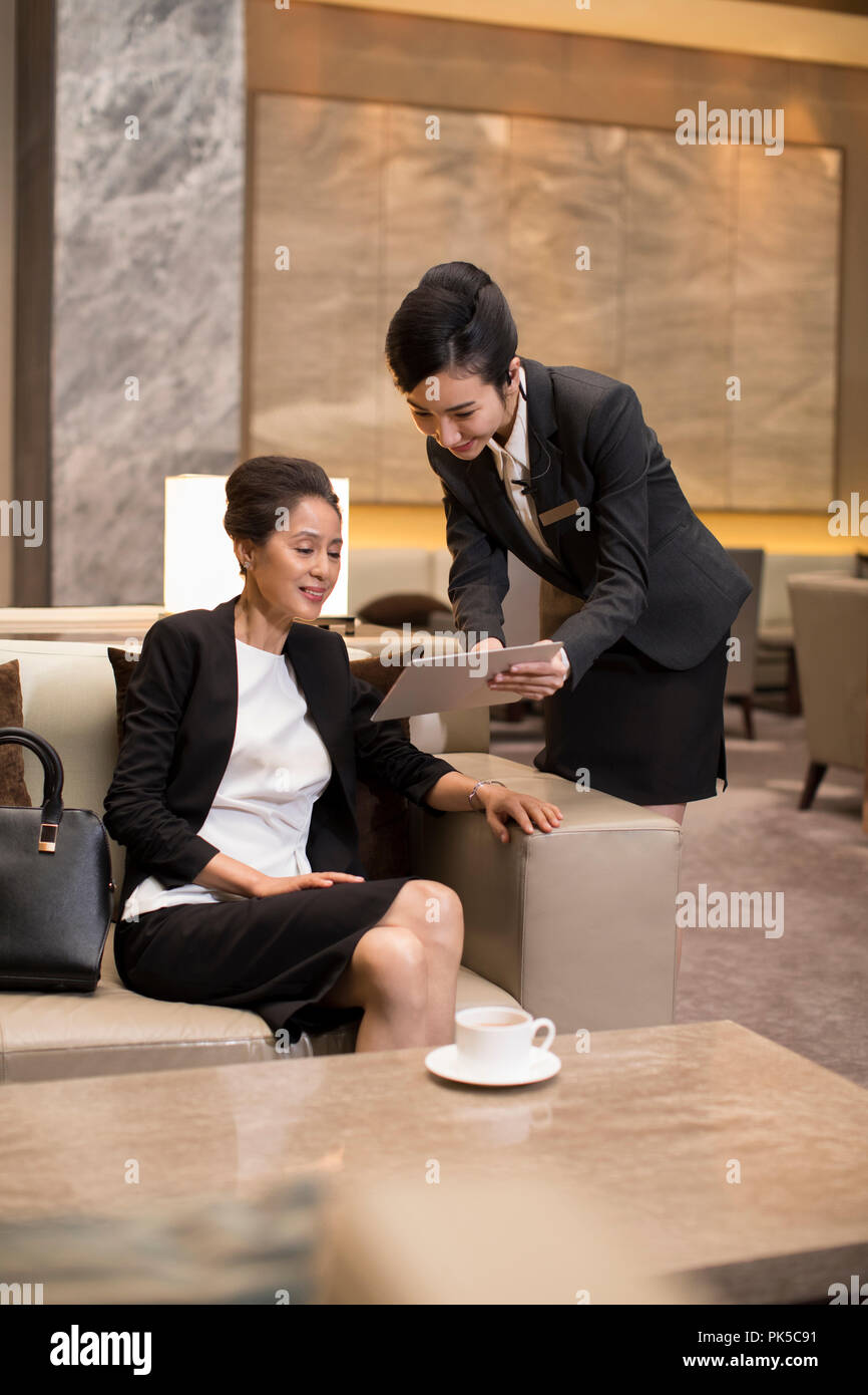 Professional service in luxury hotel Stock Photo - Alamy