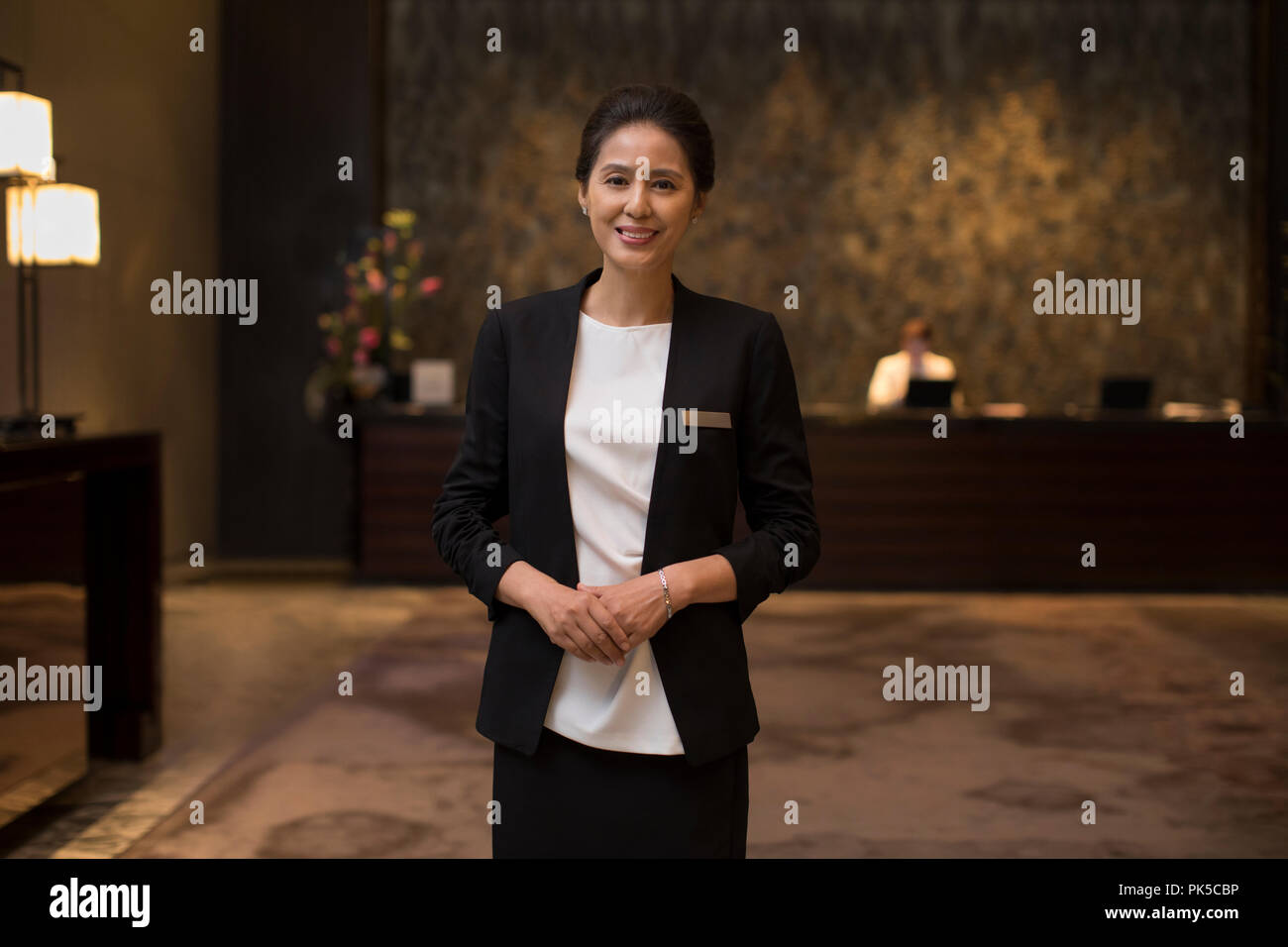 Woman managing hotel hi-res stock photography and images - Alamy