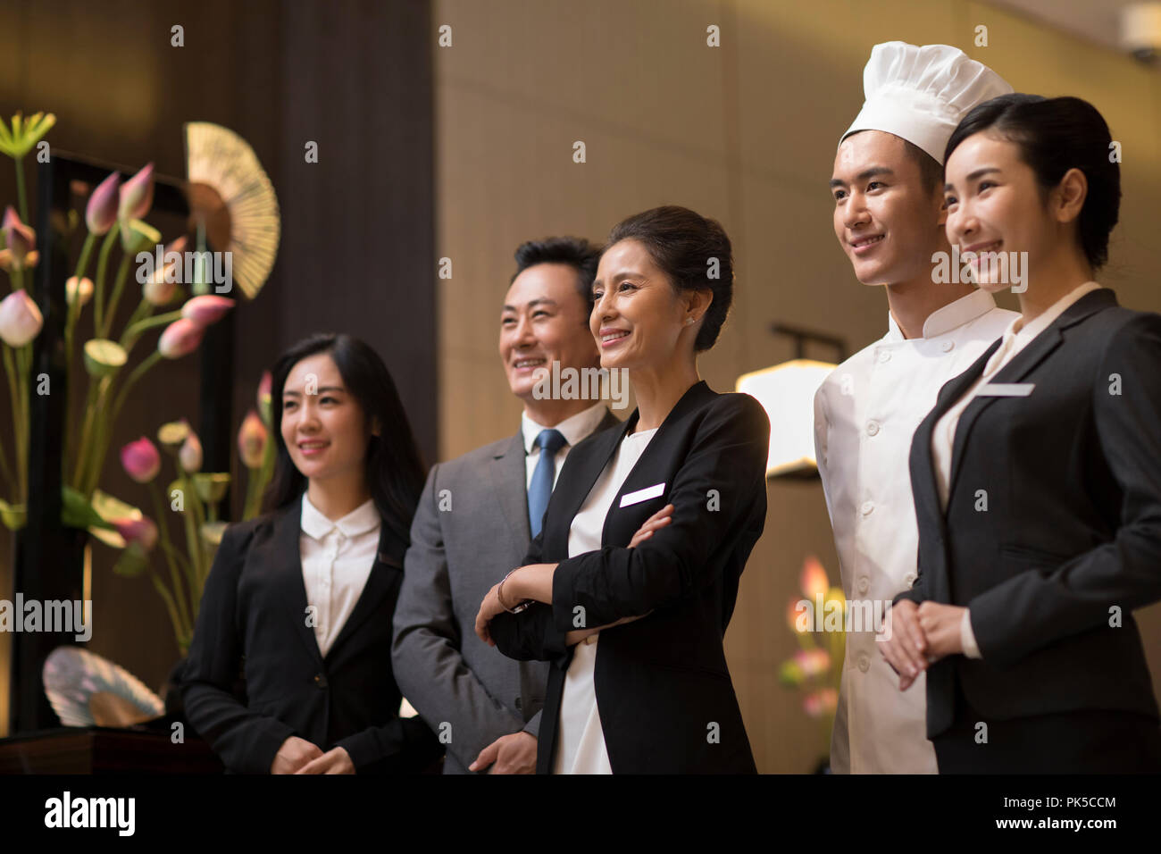 Hotel chefs in hotel lobby hi-res stock photography and images - Alamy