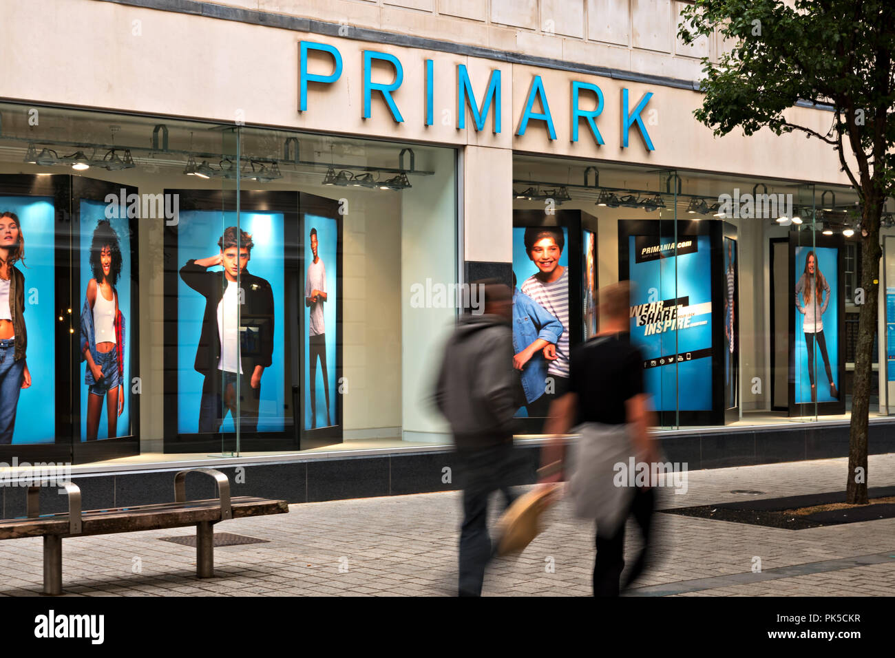 People walking past the window display of the Primark store in Church ...