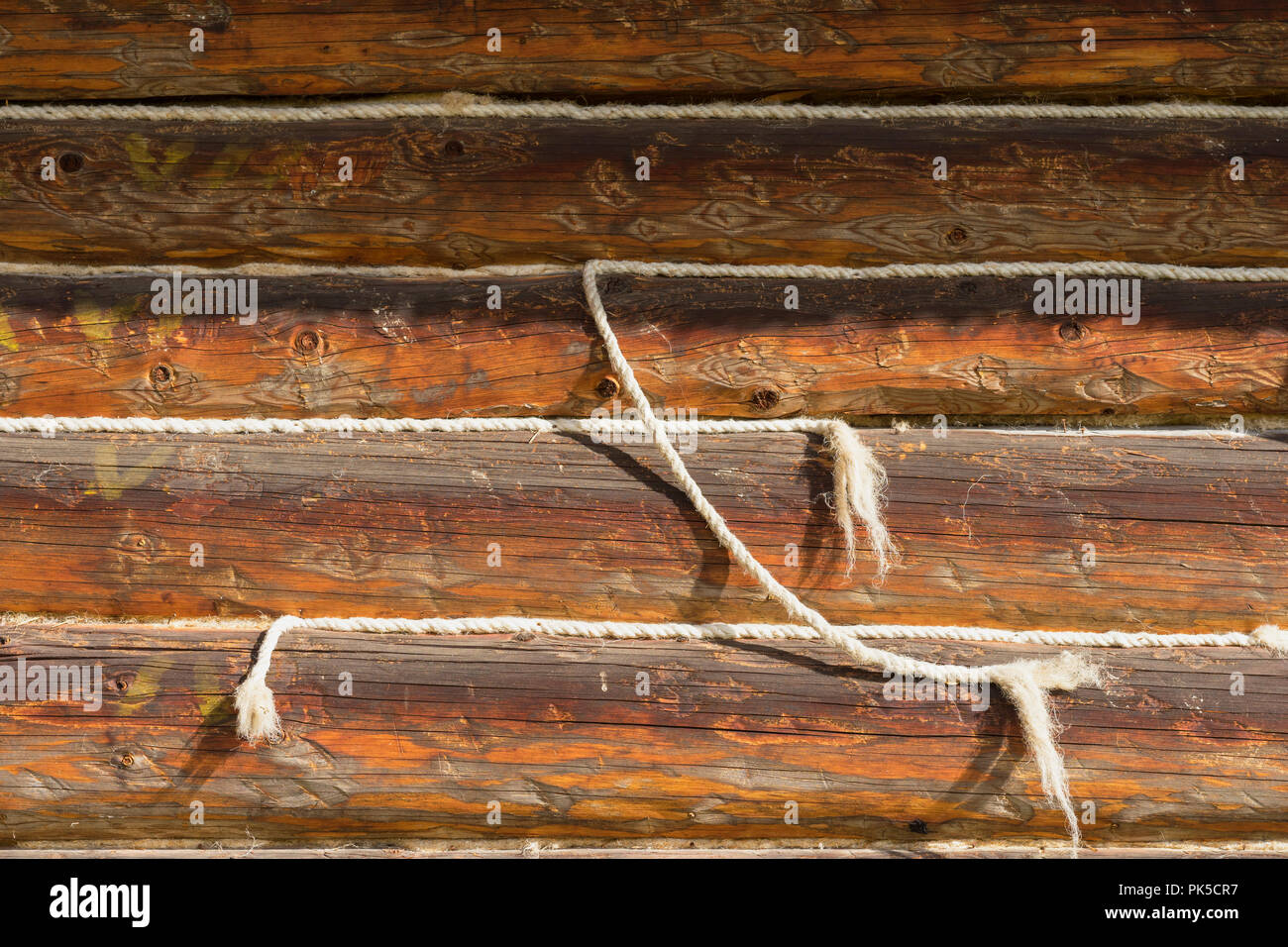 Weathered old wooden surface, texture with ropes, texture. Rustic ...