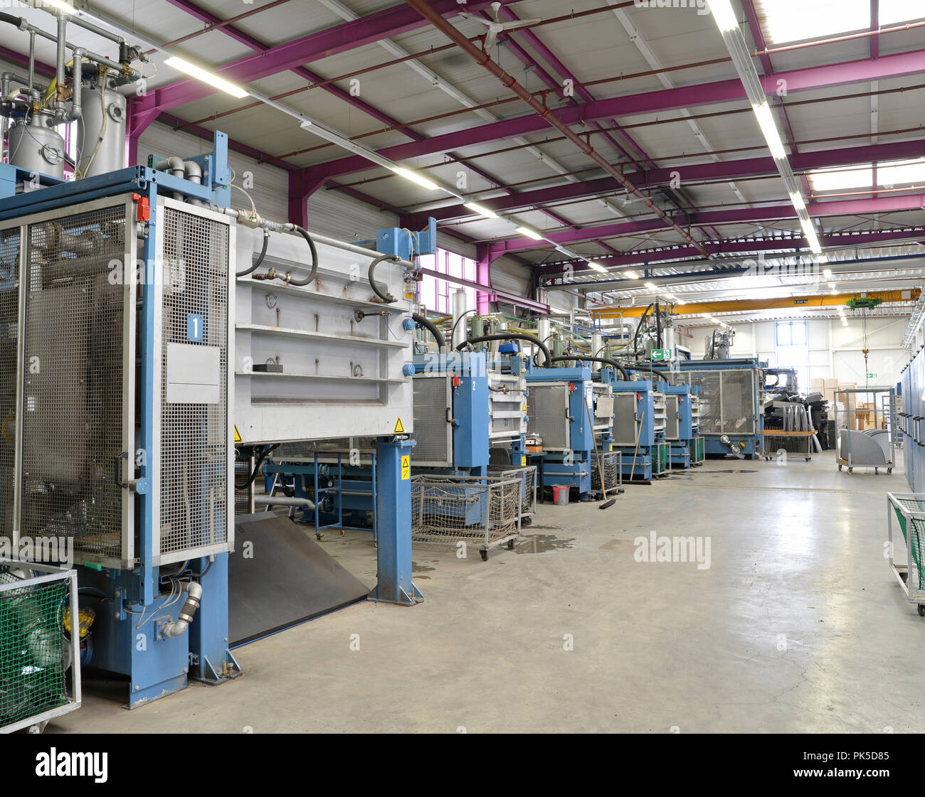 machines and interior in an industrial factory for the production of ...