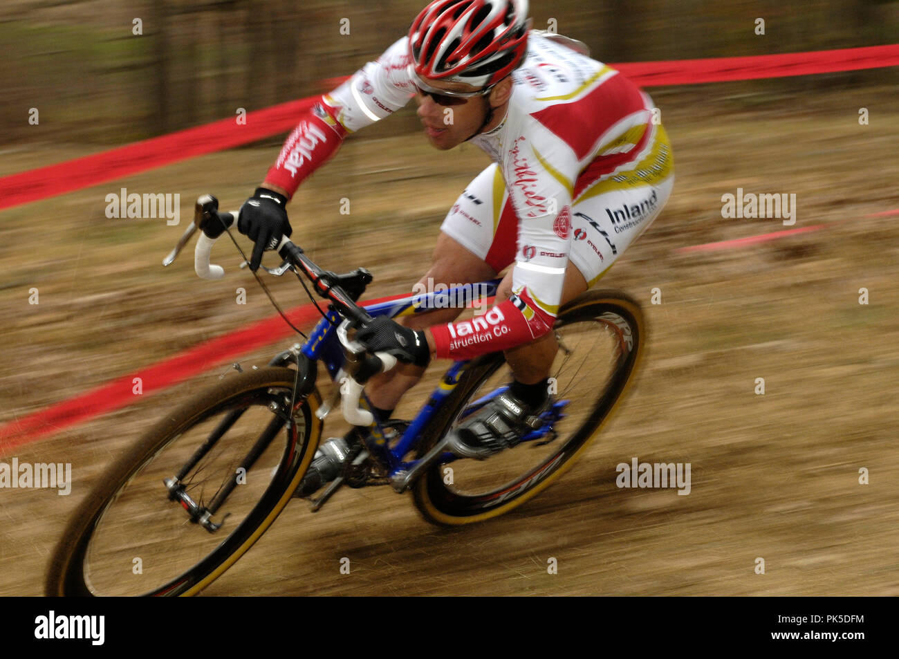 The winner Charlie Storm works hard on an off-camber high speed corner ...