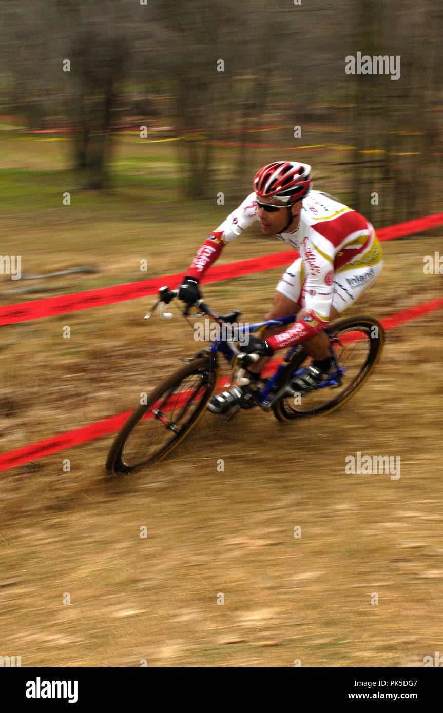 The winner Charlie Storm works hard on an off-camber high speed corner ...