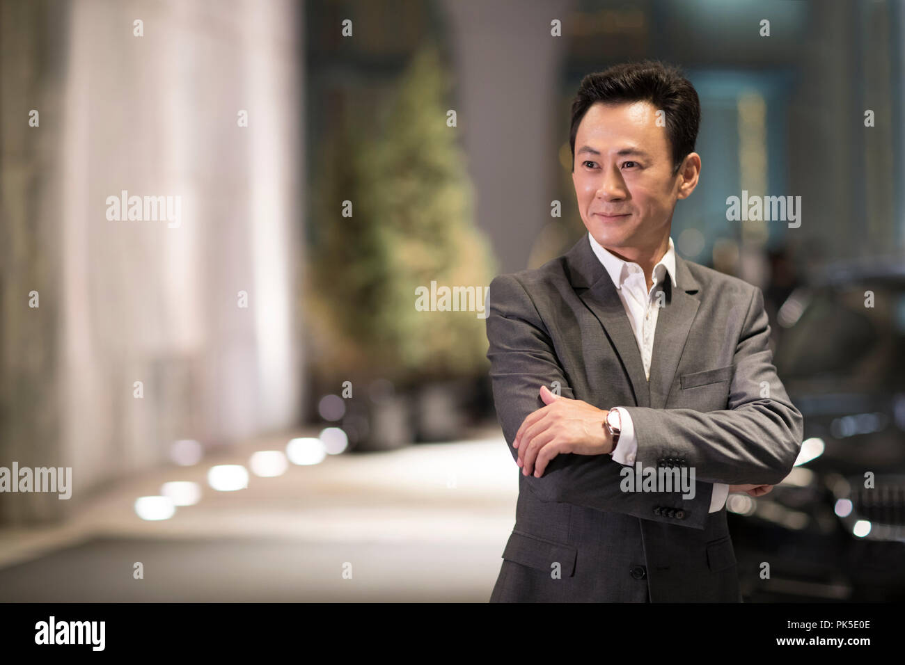 Mature businessman outdoors night hi-res stock photography and images ...