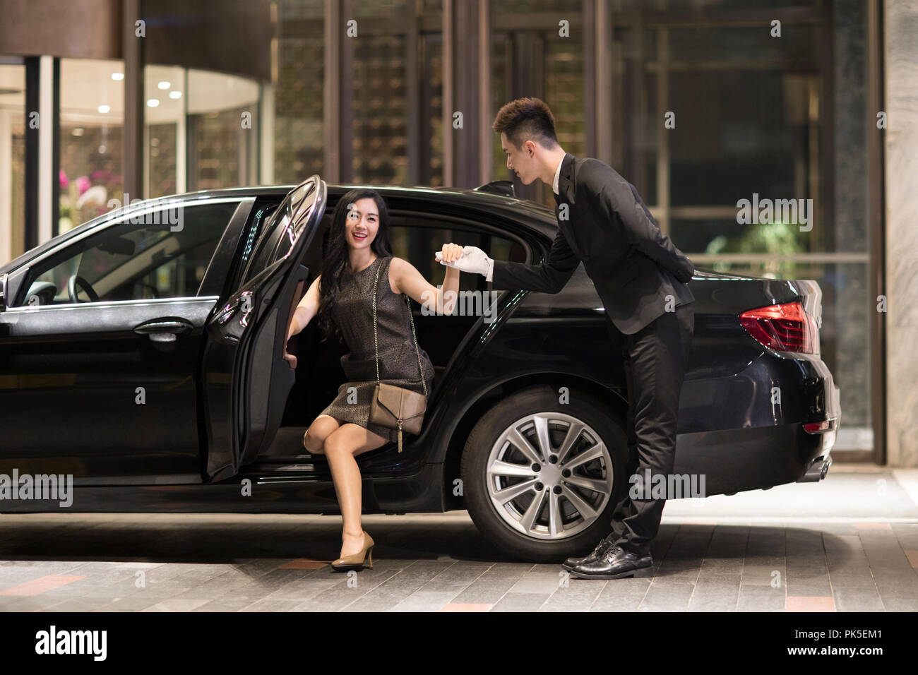 Woman getting dressed for a night out hi-res stock photography and ...