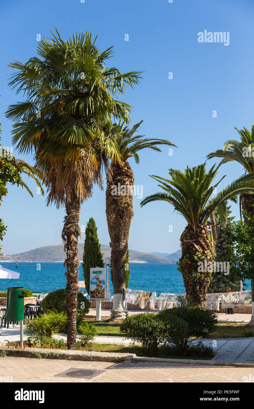 Saranda, Albania- 28 June 2014: Promenade street with palms in Saranda ...