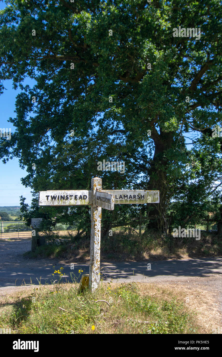 Old road sign for Alphamstone, Lamarsh and Twinstead Stock Photo - Alamy