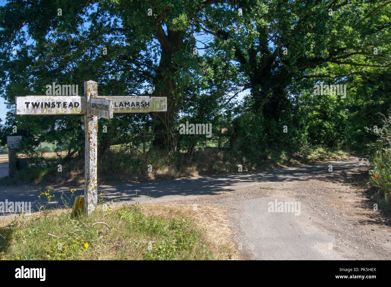 Old road sign for Alphamstone, Lamarsh and Twinstead Stock Photo - Alamy