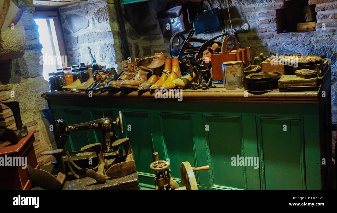 Old Shoe Workshop,shoe tools and different type shoes Stock Photo - Alamy