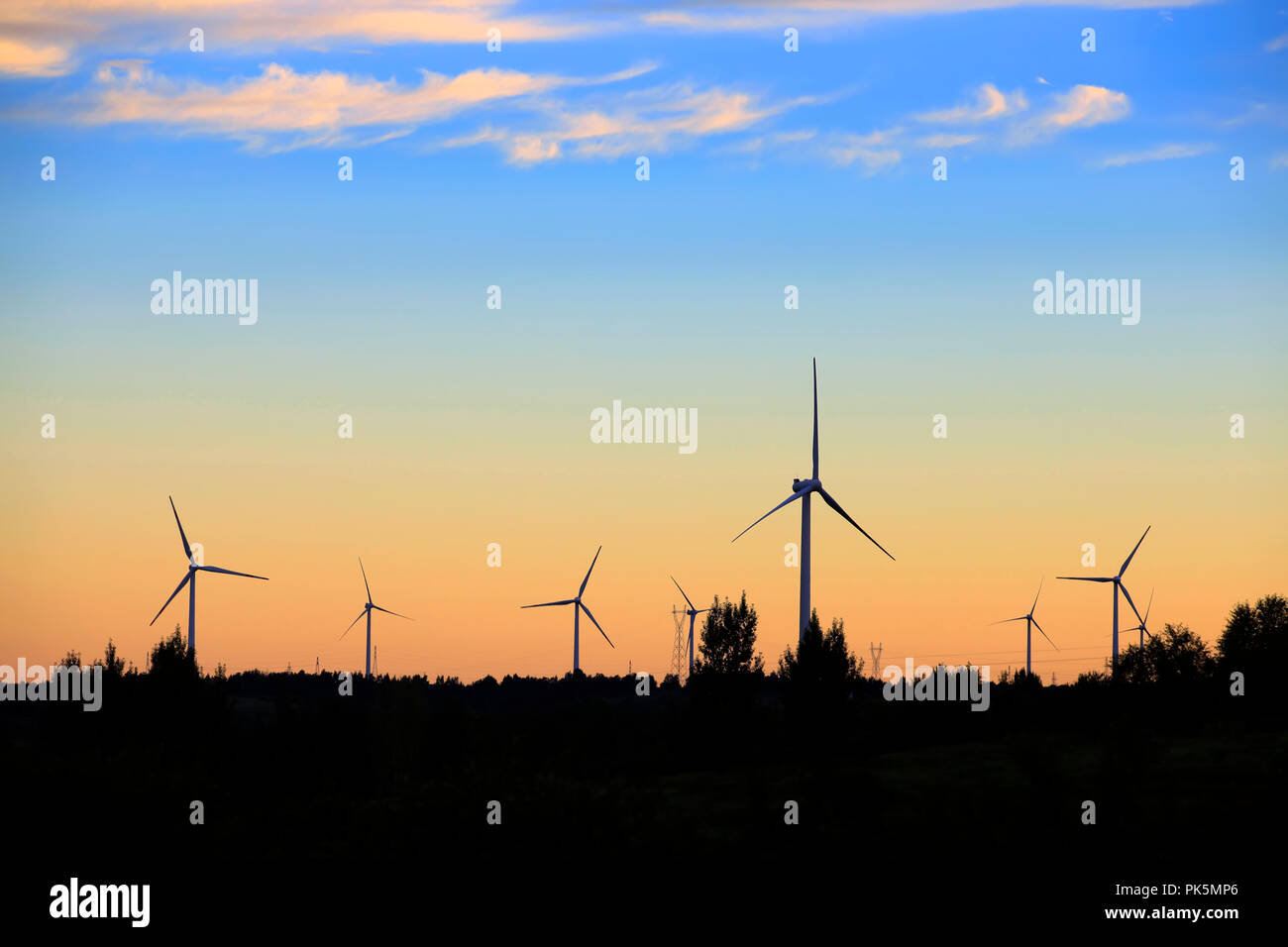 Wind turbines in the evening Stock Photo - Alamy