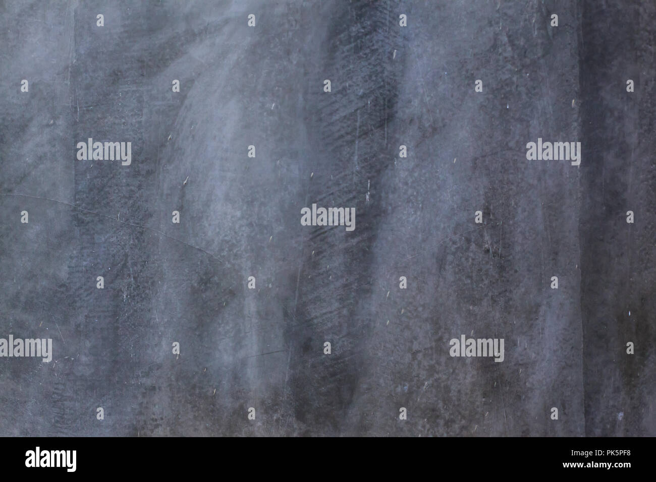 Dark bare polished exposed cement texture pattern on house wall surface ...