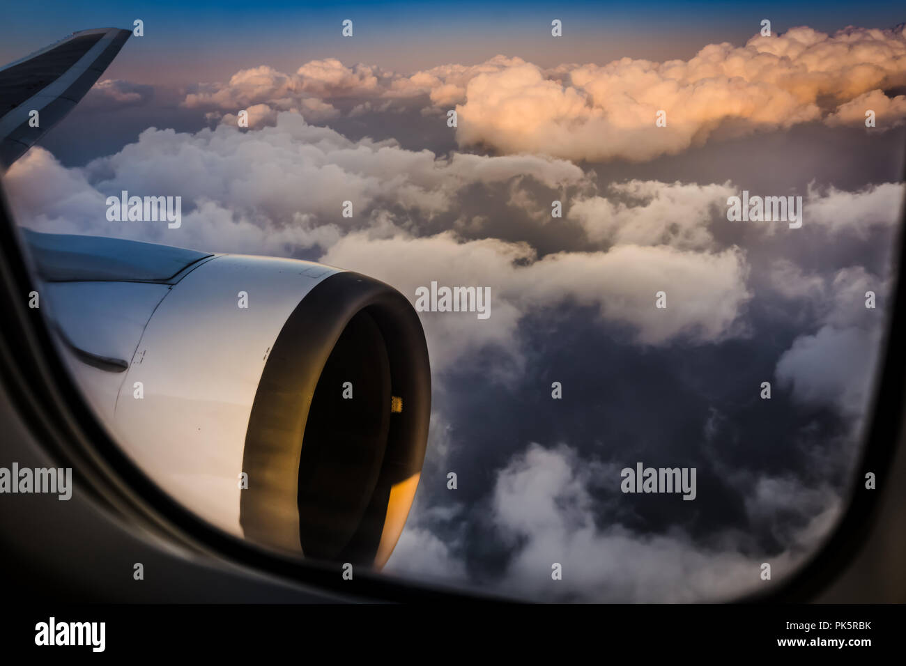 Beautiful aerial view through window of commercial airplane, part of ...