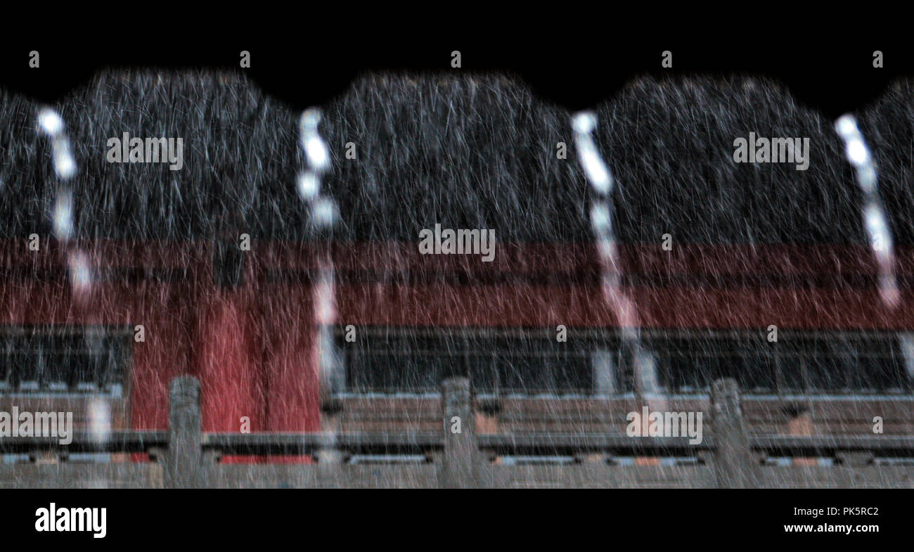 Chinese temple roof in the rain Stock Photo - Alamy