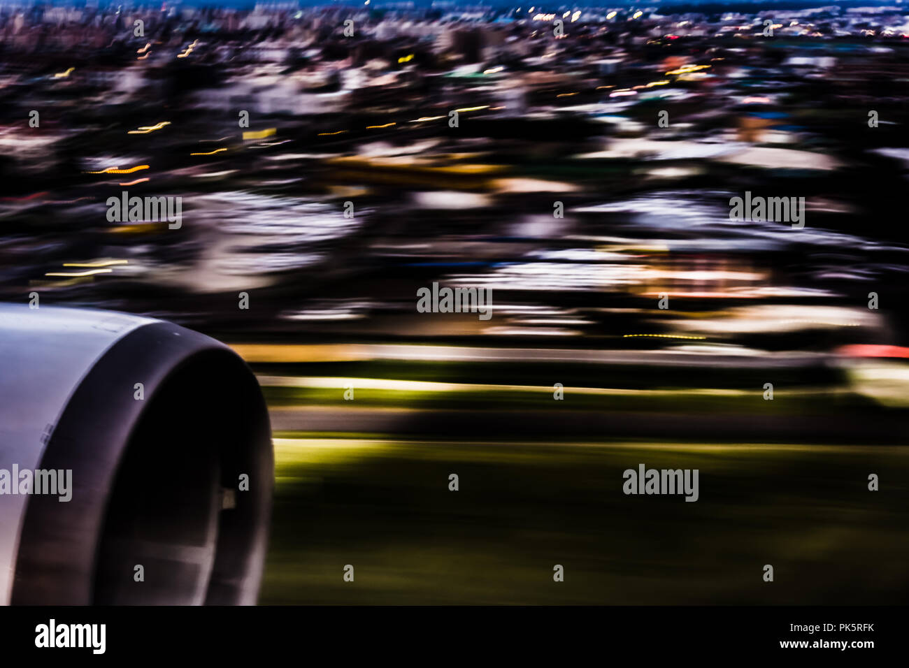 Beautiful aerial view through window of commercial airplane during ...