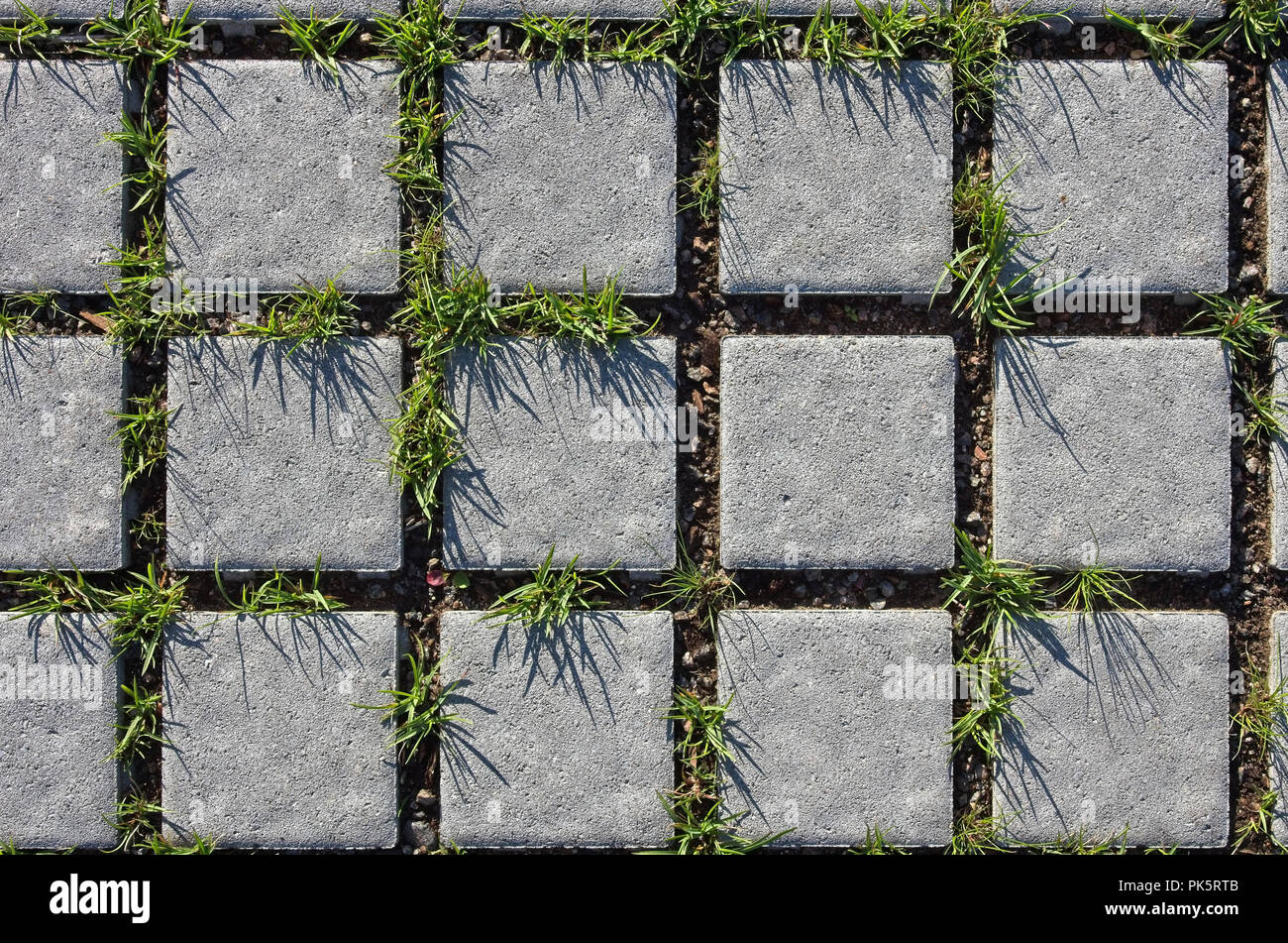 concrete tiles on ground Stock Photo - Alamy