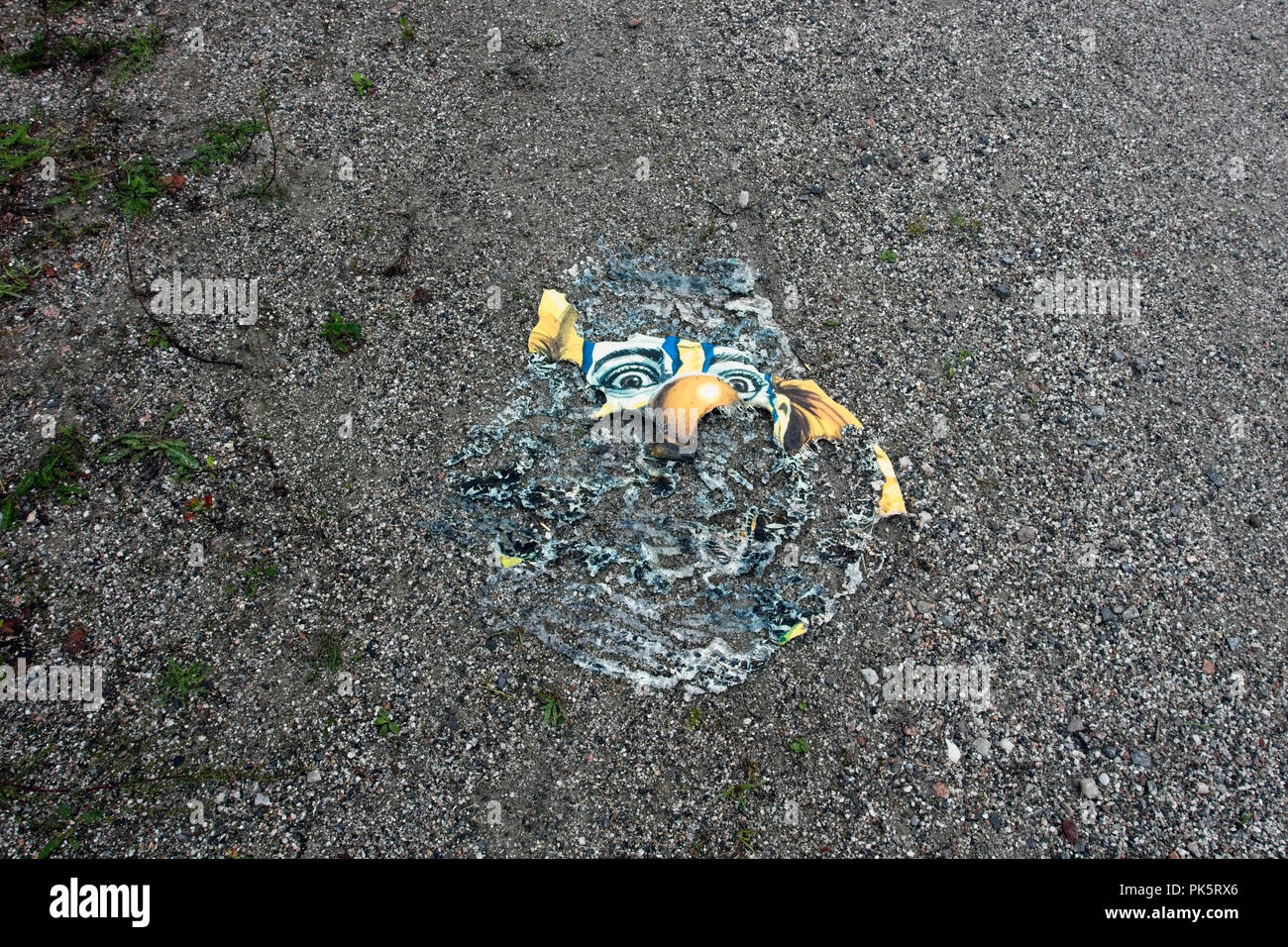 burned circus poster on ground Stock Photo - Alamy