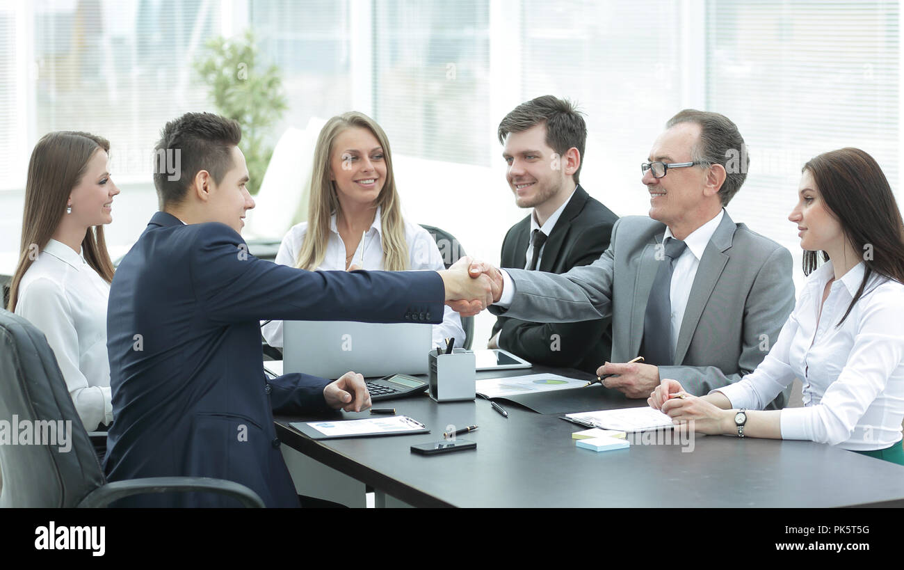 business partners shaking hands after a successful transaction Stock ...