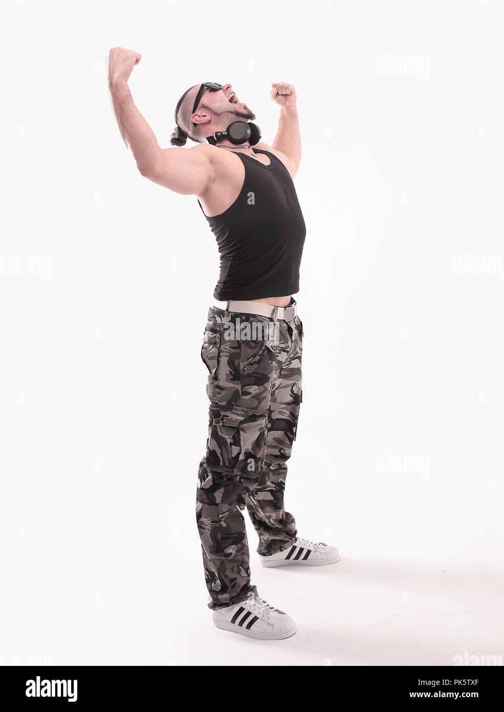 in full growth.a very happy rapper.isolated on white background Stock ...