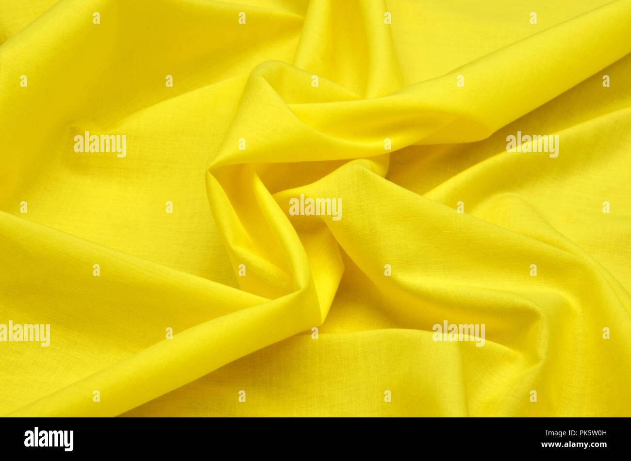 Bright yellow cotton fabric with added elastane for blouses Stock Photo ...