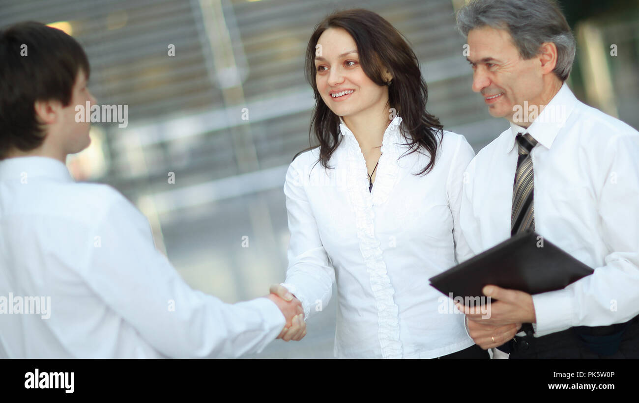 meeting business partners in a large modern office Stock Photo - Alamy